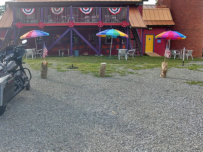 The gravel parking lot filled with Minis speaks volumes – this unassuming rustic exterior draws serious food pilgrims from across state lines.