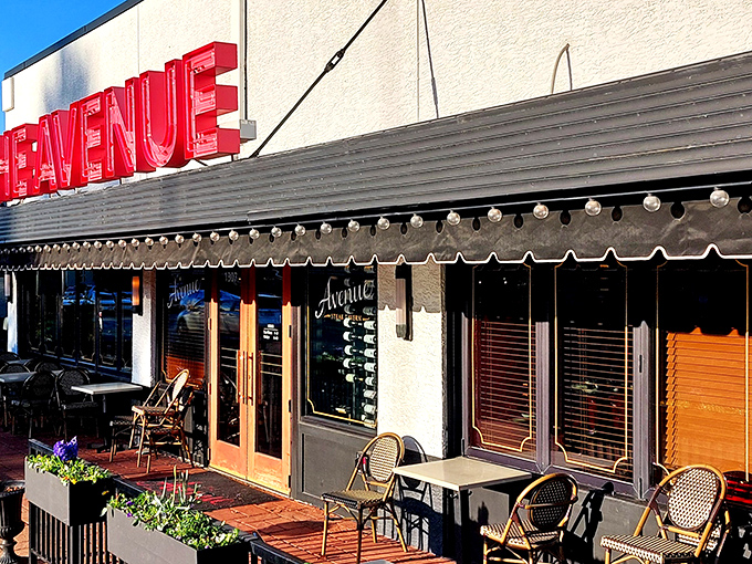 That iconic red neon sign isn't just announcing dinner—it's promising a culinary love affair with properly cooked beef in Columbus.