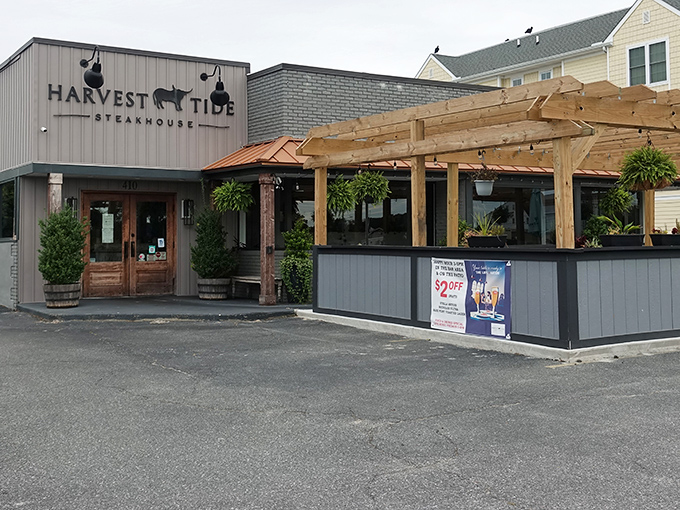 Harvest Tide's welcoming exterior promises culinary adventures within, where coastal charm meets steakhouse sophistication under Delaware's expansive sky.