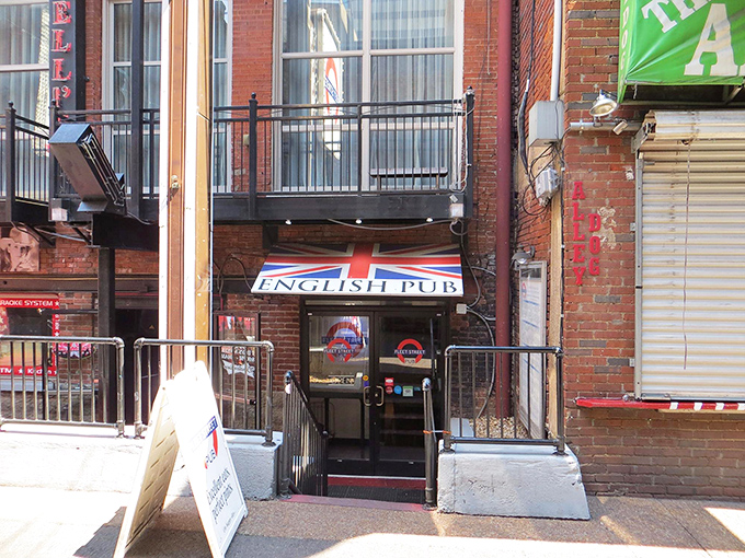 The Union Jack awning beckons like a British embassy on Nashville soil. This brick-faced pub promises authentic flavors in the heart of Printer's Alley.