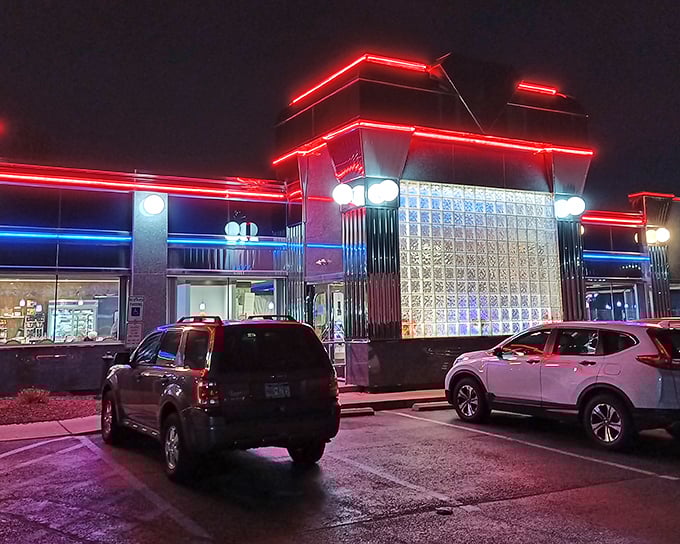 The gleaming silver exterior of Springfield Diner stands like a time capsule of Americana, beckoning hungry travelers with its retro-modern charm.