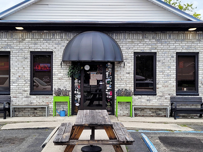 The unassuming brick exterior of Early Bird Diner hides culinary treasures within. Like finding a Picasso at a yard sale, the modest façade belies the masterpieces inside.