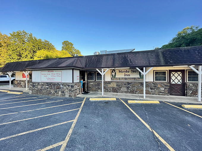 The unassuming exterior of Monte Ne Inn Chicken belies the culinary magic happening inside. Pilgrims of perfect poultry gather at dusk, drawn by decades of delicious reputation.