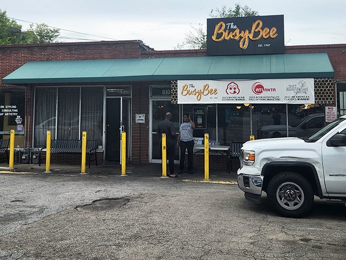 The unassuming storefront that's launched a thousand food pilgrimages. Atlanta's culinary landmark stands proudly on MLK Drive, yellow poles standing guard like sentinels of soul food.