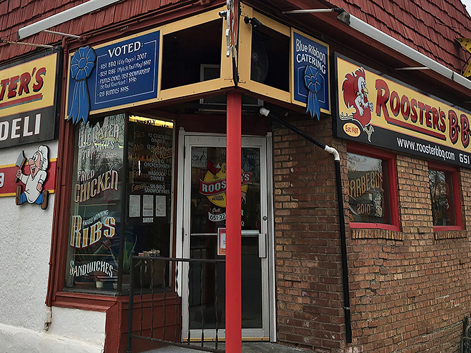 The iconic red exterior of Rooster's BBQ Deli stands like a beacon to hungry Minnesotans, complete with its blue ribbon of approval and cartoon mascot.
