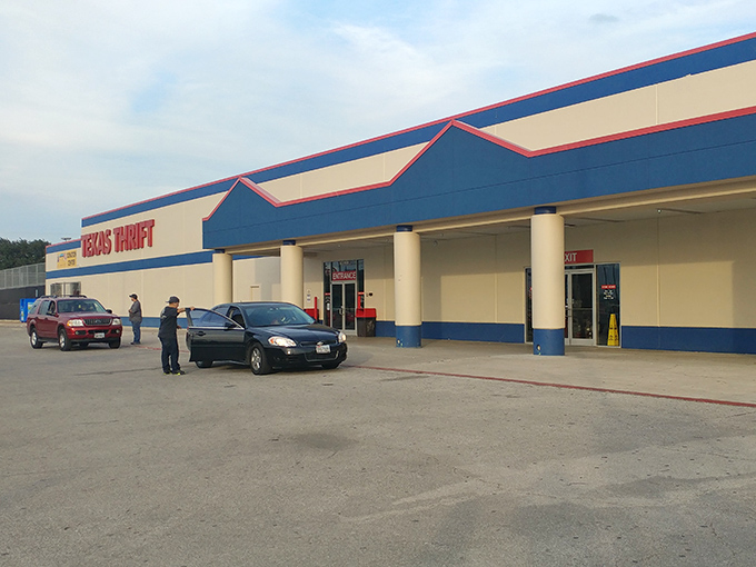 The blue and red exterior of Texas Thrift stands like a beacon of bargain possibilities, promising treasure hunts that won't break the bank.