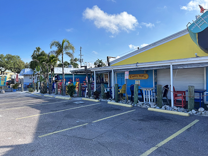 The iconic turquoise exterior of Crabby Bill's stands out against the Florida sky like a beacon for hungry beachgoers seeking seafood salvation.
