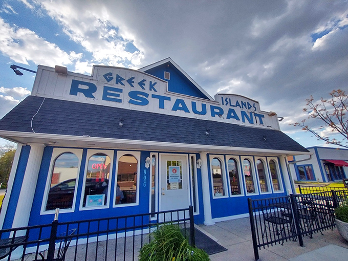 The iconic blue and white facade of The Greek Islands Restaurant stands like a Mediterranean mirage in Indianapolis, promising culinary adventures without the passport hassle.
