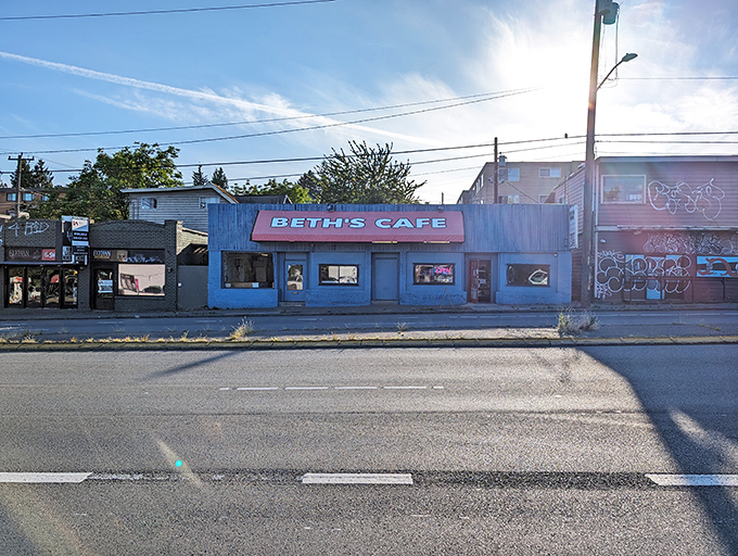 The unmistakable bright blue exterior with cherry-red awning says it all: culinary treasures don't always hide in fancy packages.