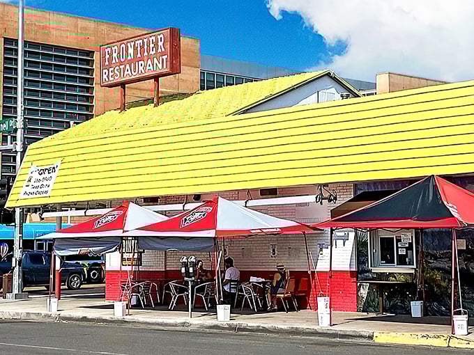 The iconic red and white facade of Frontier Restaurant stands as an Albuquerque landmark, beckoning hungry travelers with promises of New Mexican comfort food.