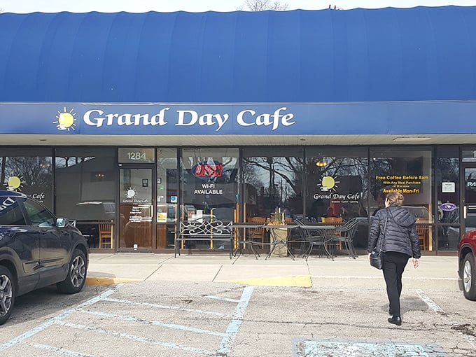 Like a beacon of breakfast hope, Grand Day Cafe's blue awning signals salvation for hungry Columbus locals seeking their morning hash brown fix.