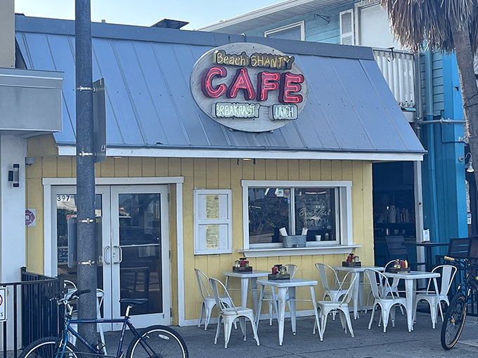 The cheerful yellow exterior of Beach Shanty Cafe beckons like a sunrise, promising breakfast treasures just steps from Clearwater's famous white sands.