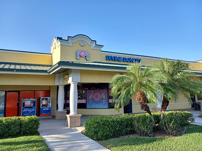 The cheerful yellow facade of Divine Donuts stands out like a sugary beacon in Fort Myers, promising sweet salvation for donut enthusiasts.
