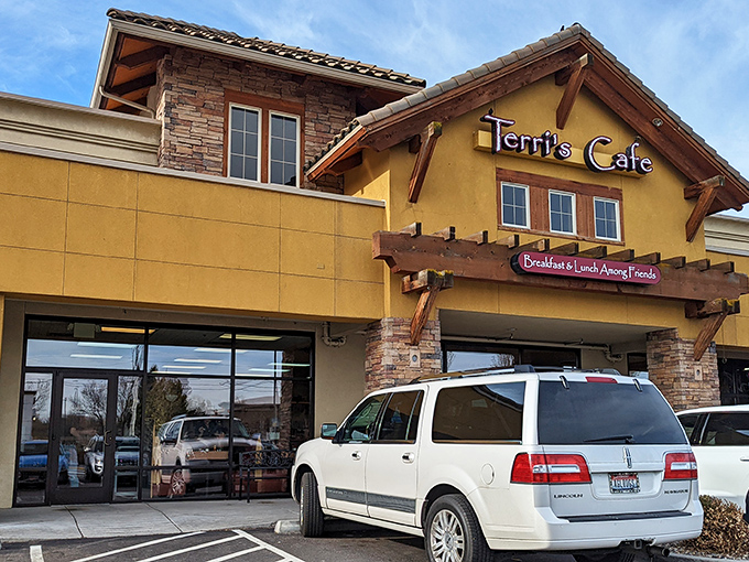 Terri's Café welcomes you with its warm yellow exterior and rustic wooden accents—like a mountain lodge that happens to serve life-changing pancakes.