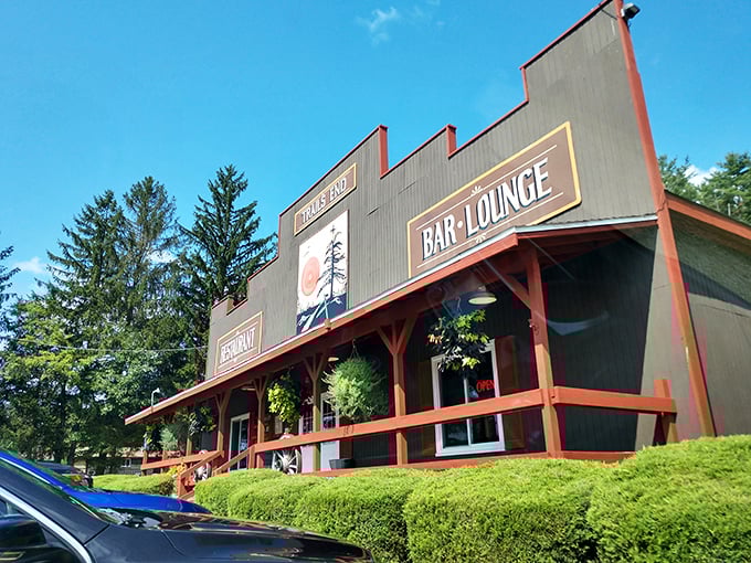 The frontier-style façade of Trail's End Restaurant stands proudly against the Pennsylvania sky, its rustic charm beckoning hungry travelers like a culinary lighthouse in the forest.