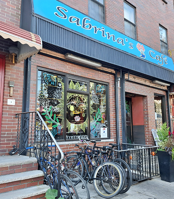 The bright blue awning of Sabrina's Café stands out like a breakfast beacon, promising morning delights to Philadelphia's hungry masses.