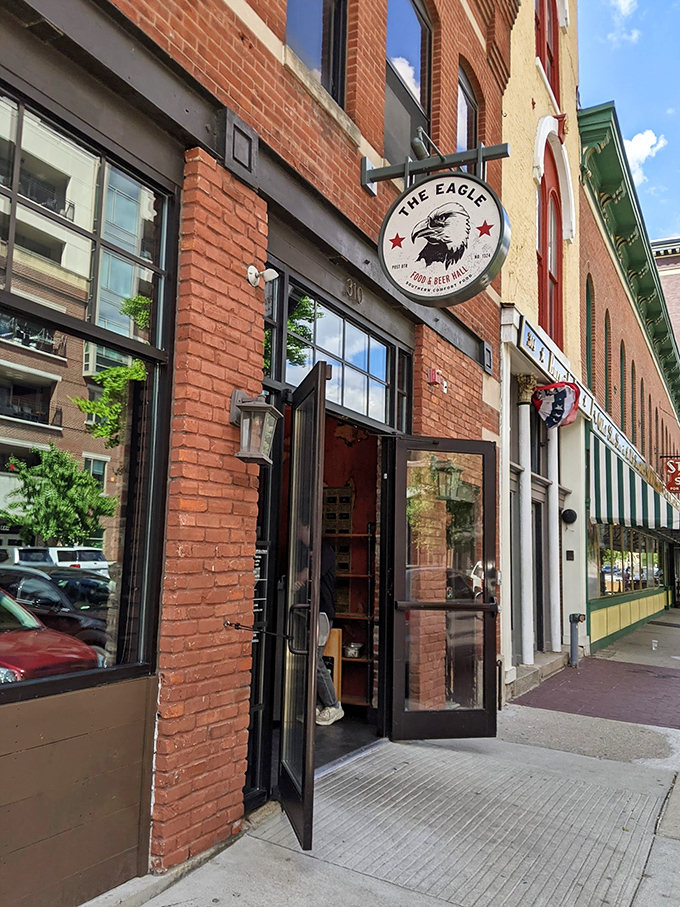 The Eagle's brick façade on Mass Ave beckons like an old friend, promising comfort food that'll make you forget your troubles—and possibly your diet.