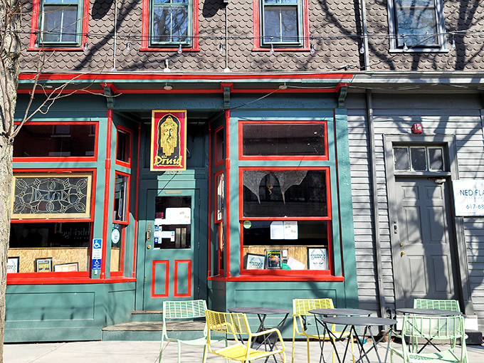 The emerald facade with cherry-red trim isn't just eye-catching—it's a promise that inside this unassuming Cambridge corner, culinary magic awaits.