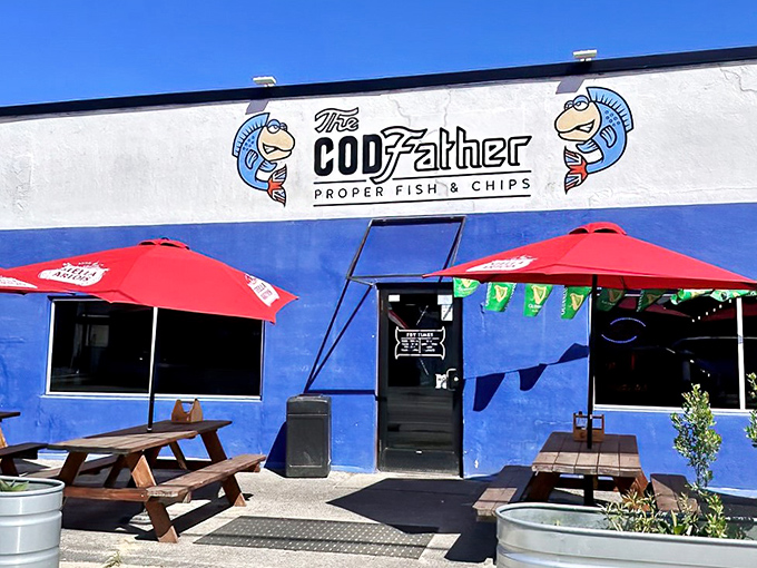 The bright blue exterior of The CODfather stands like a British embassy on American soil, complete with cartoon fish mascots making an offer you can't refuse.