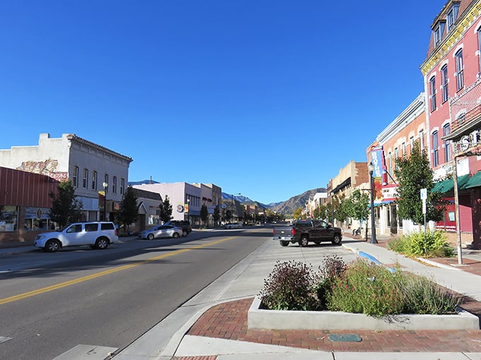 Historic brick buildings line Main Street in Cañon City, where Pizza Madness offers a slice of local flavor amid architecture that whispers tales of Colorado's past.