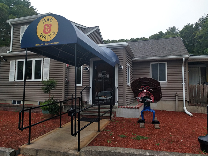 The unassuming exterior of Mac & Walt's proves once again that the best comfort food often hides in plain sight among New England's pines.