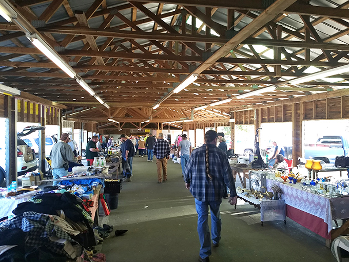 The cathedral of collectibles awaits! Wooden rafters preside over this hallowed ground where bargain hunters worship at the altar of "previously loved" treasures.
