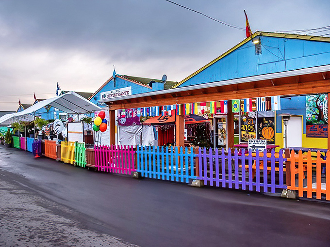 The vibrant blue exterior of M&M Marketplace stands out like a beacon of bargain-hunting hope, complete with cheerful yellow accents that promise colorful discoveries inside. 