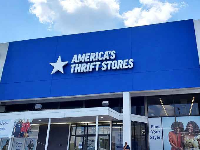 The bright blue storefront beckons like a beacon of bargain possibilities, promising treasures behind those sliding doors.