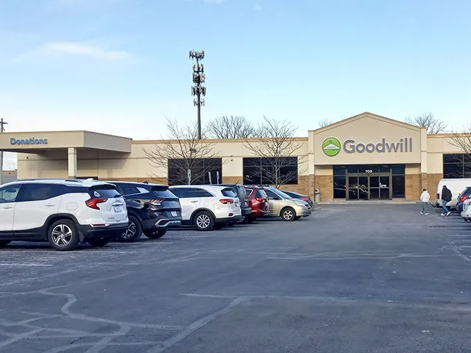 The unassuming exterior of Greenwood's Goodwill hides a treasure trove within, like finding a secret passage to bargain paradise.