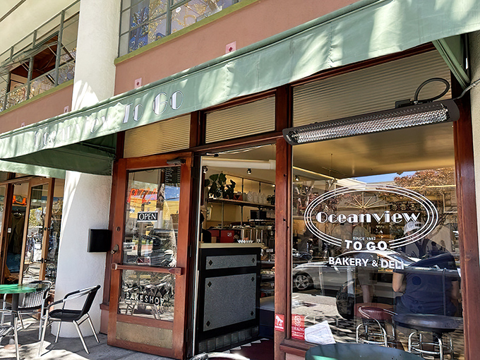 The unassuming green awning of Oceanview Diner beckons like a time portal to simpler days when conversation trumped smartphones and meatloaf reigned supreme.