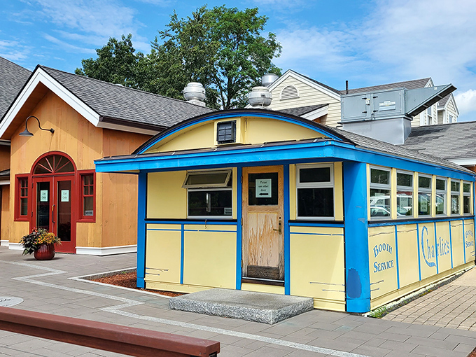 The iconic blue and cream Worcester dining car sits proudly alongside the expanded restaurant, like a time capsule of American comfort food history.