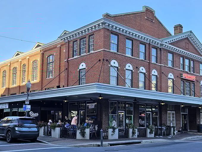 The brick façade of The Hatch stands proudly in downtown Roanoke, a culinary beacon with its welcoming green trim and flower boxes that whisper, "Come hungry, leave happy."