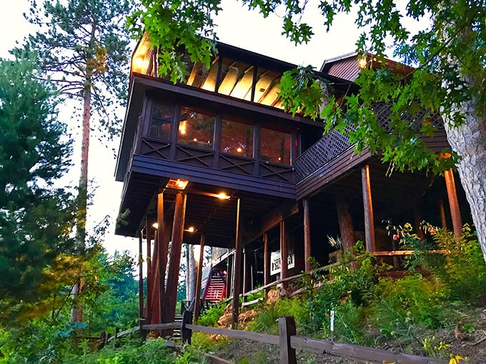 Perched among towering pines like a woodland treehouse for grown-ups, Ishnala's exterior promises the kind of dining adventure that makes memories.