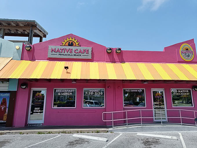 The hot pink facade of Native Cafe isn't just a building—it's a mood statement that screams "vacation calories don't count!"