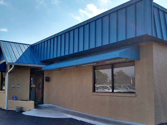 The unassuming blue-roofed exterior of Harry's might not scream "pancake paradise," but locals know better. Culinary treasures often hide in plain sight.