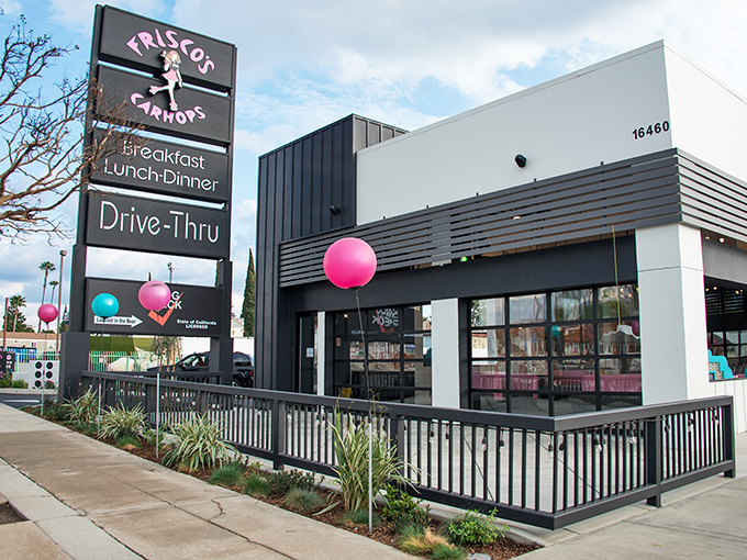 Frisco's sleek exterior blends modern design with retro flair, those pink balloons practically screaming "fun happens here" to everyone driving past.