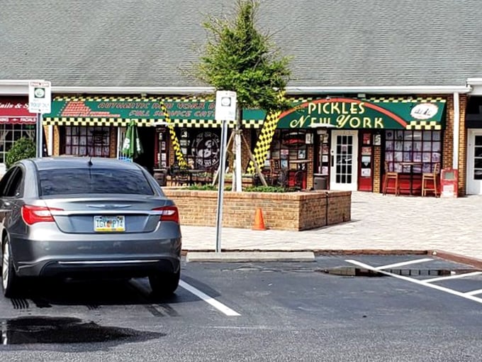 The iconic green and red awning of Pickles beckons like a New York mirage in the Florida sunshine. A delicious portal to another world.