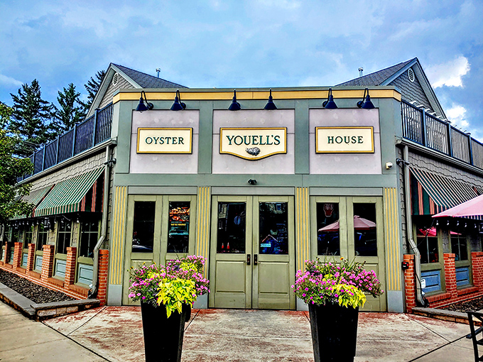 The cheerful yellow exterior of Youell's Oyster House stands like a beacon of seafood hope in landlocked Allentown. Those flower planters aren't just pretty—they're a promise of good things to come.