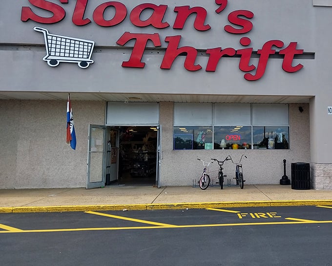 The iconic red signage of Sloan's Thrift stands as a beacon of bargain hope in Bristol, complete with that charming shopping cart logo that promises treasure hunting adventures.