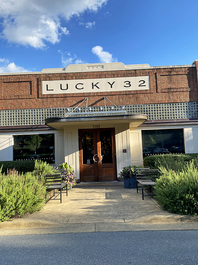 The brick facade of Lucky 32 stands like a Southern sentinel, promising culinary treasures within. No wonder folks make the pilgrimage from across the state.