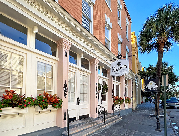 Magnolias' pink façade stands like Charleston's culinary equivalent of a Southern belle—graceful, inviting, and hiding delicious secrets behind those elegant windows.