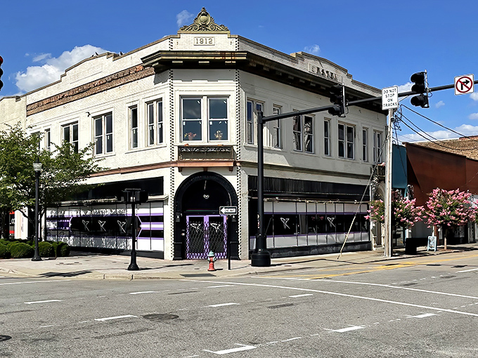 Historic buildings stand sentinel at this downtown intersection, where time seems to move at its own comfortable pace.