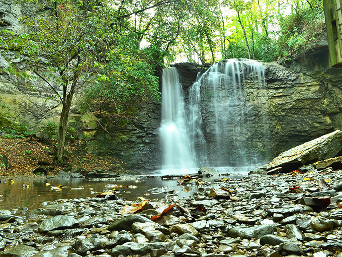 Nature's masterpiece in full flow – Hayden Falls creates a mesmerizing curtain of water against ancient limestone that's been perfecting its performance for millennia.