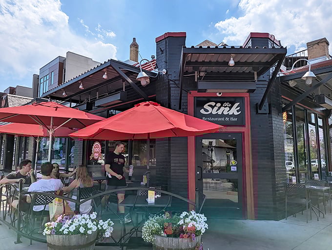 The Sink's iconic black exterior with red trim welcomes hungry pilgrims to this Boulder institution. Those red umbrellas promise shade for your burger-induced euphoria.