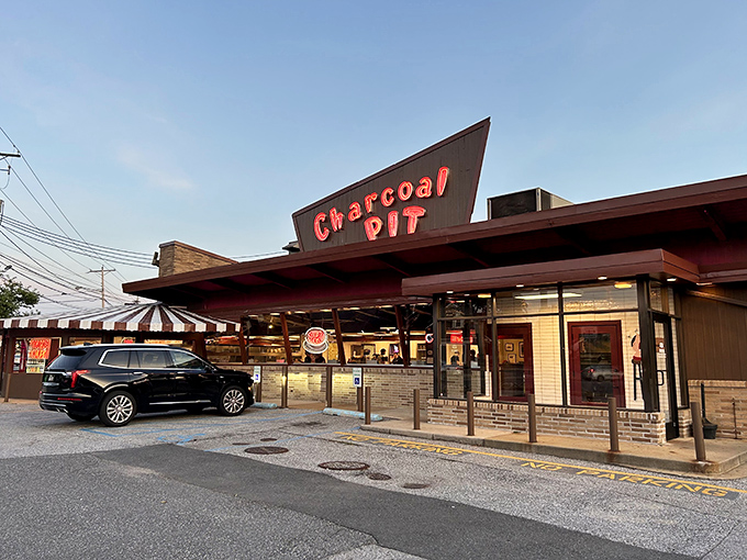 That iconic angular roof isn't just architectural flair—it's a beacon calling hungry Delawareans home like a mid-century modern lighthouse for cheeseburger enthusiasts.