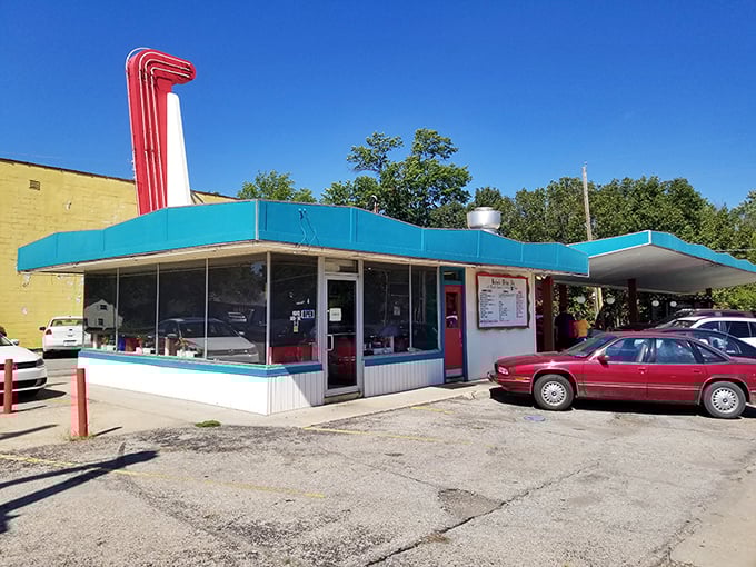The iconic Bobo's sign stands tall against the Kansas sky, a neon beacon promising burger bliss to weary travelers.