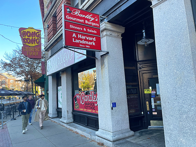The iconic red signage of Mr. Bartley's stands as a beacon of burger excellence in Harvard Square, promising culinary salvation to hungry scholars and visitors alike.
