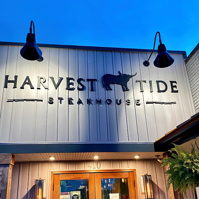 The sign beckons like a lighthouse for hungry souls. At night, Harvest Tide transforms from restaurant to culinary destination worth the pilgrimage.