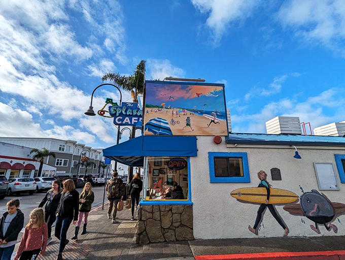 The iconic blue-and-white exterior of Splash Café stands like a beacon for chowder pilgrims, complete with that charming surfboard signaling delicious waves ahead.