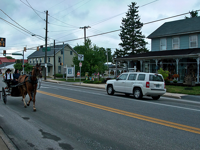 The quintessential Amish Country experience: a horse-drawn buggy ambling down a country road where life moves at the refreshing pace of yesterday.